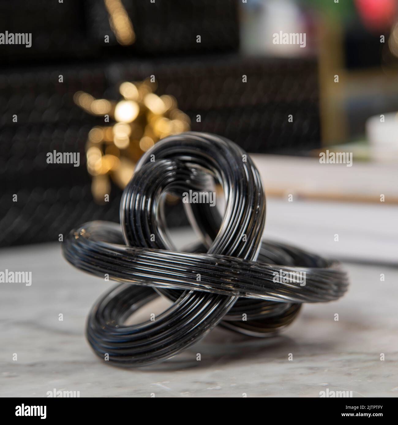 decorative glass object on coffee table Stock Photo - Alamy