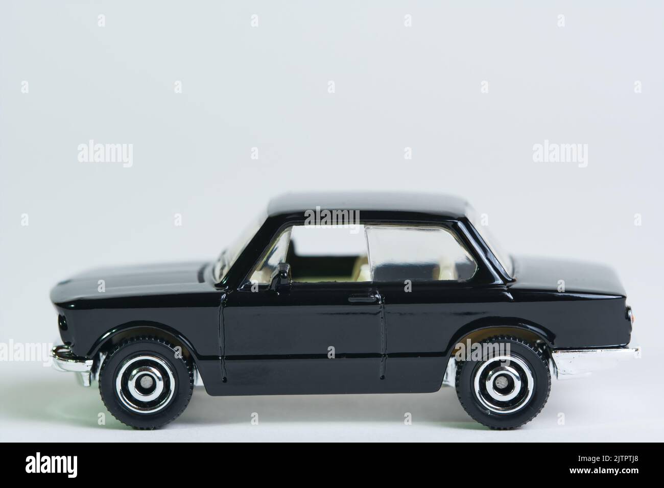 Black retro toy car, miniature model car, vintage, oldtimer on white ...