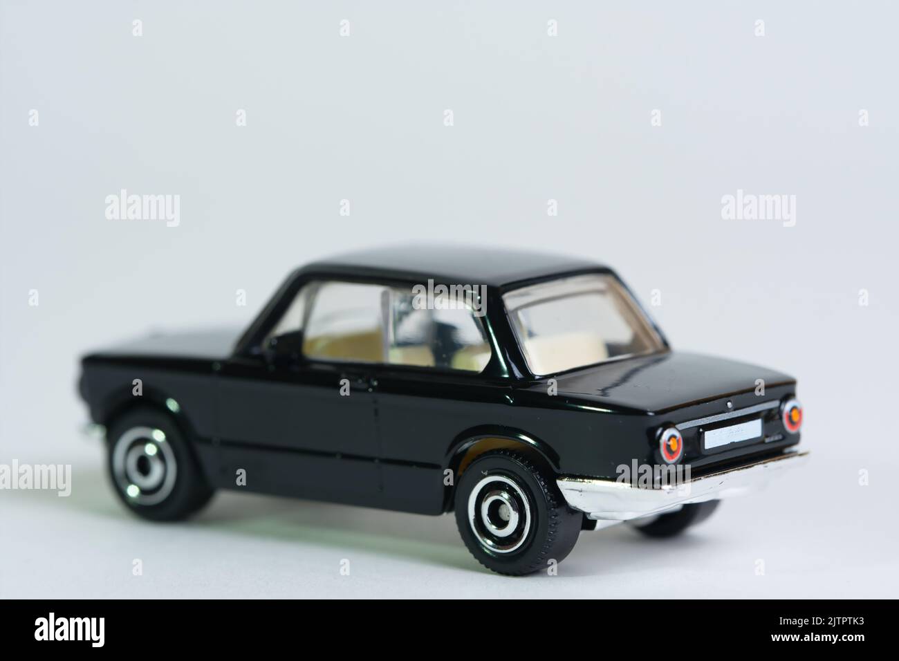 black retro toy car, miniature model car, vintage, oldtimer on white ...