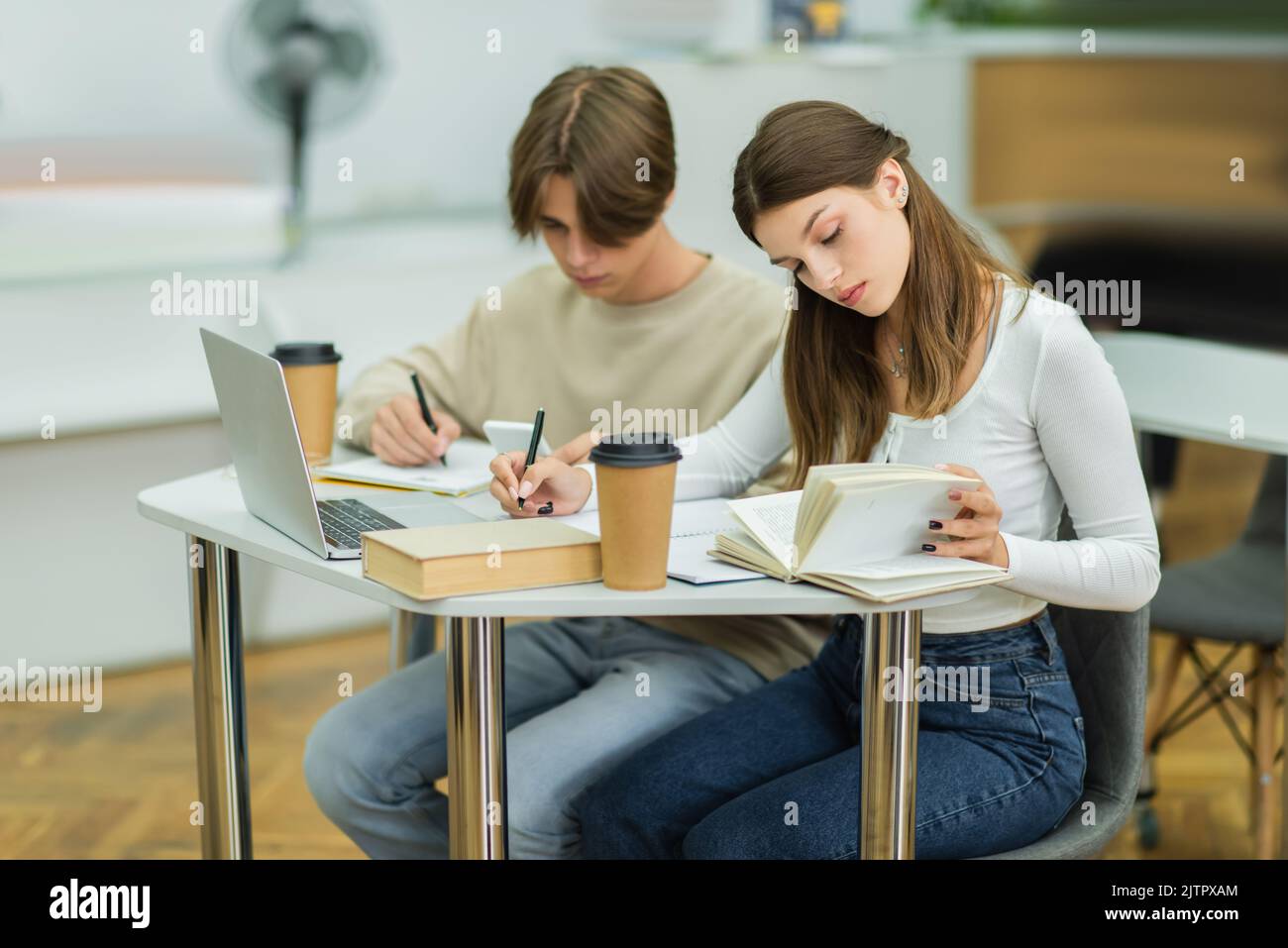 Students writing together library hi-res stock photography and images ...