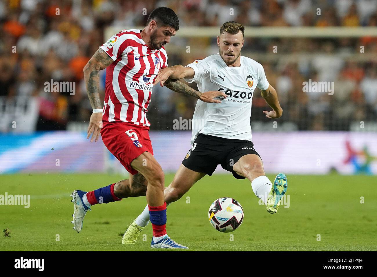 Valencia CF's Toni Lato (r) and Atletico de Madrid's Rodrigo de Paul ...