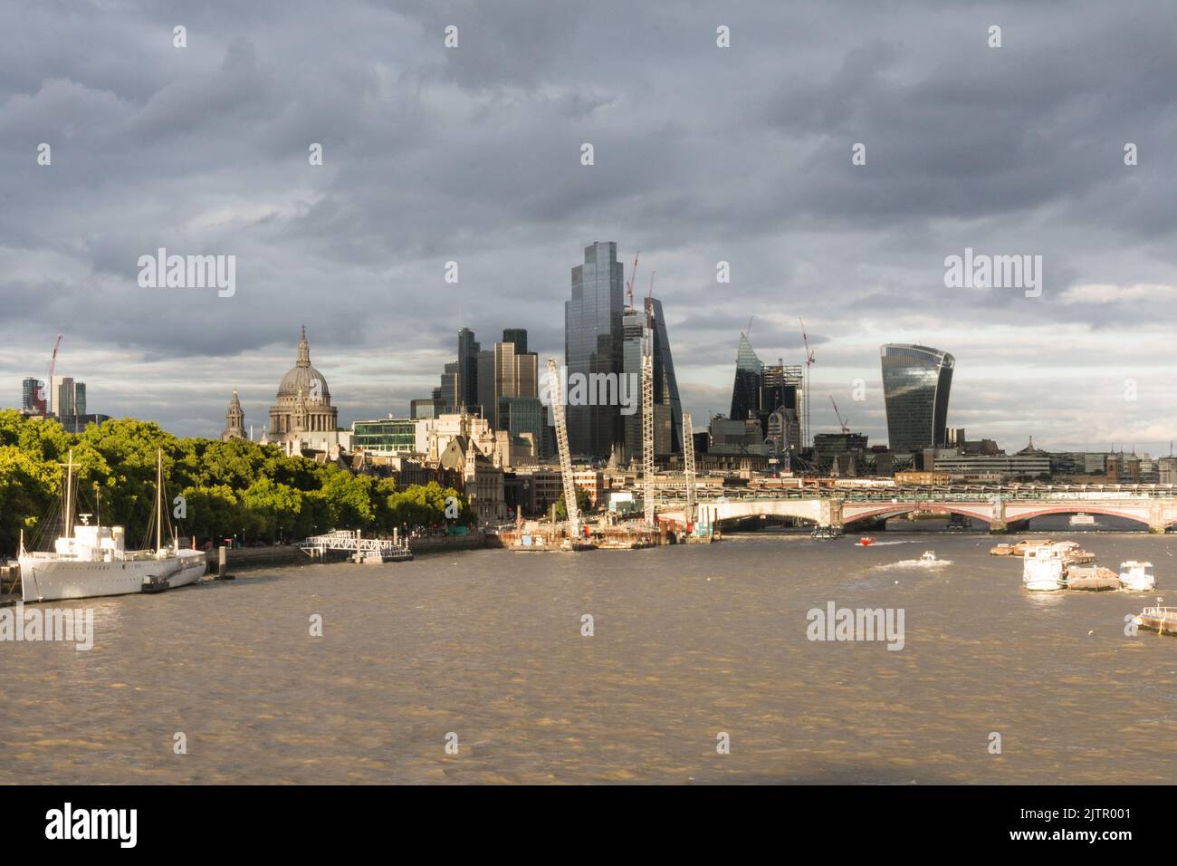 A view of the River Thames and the skyscrapers of the City of London ...