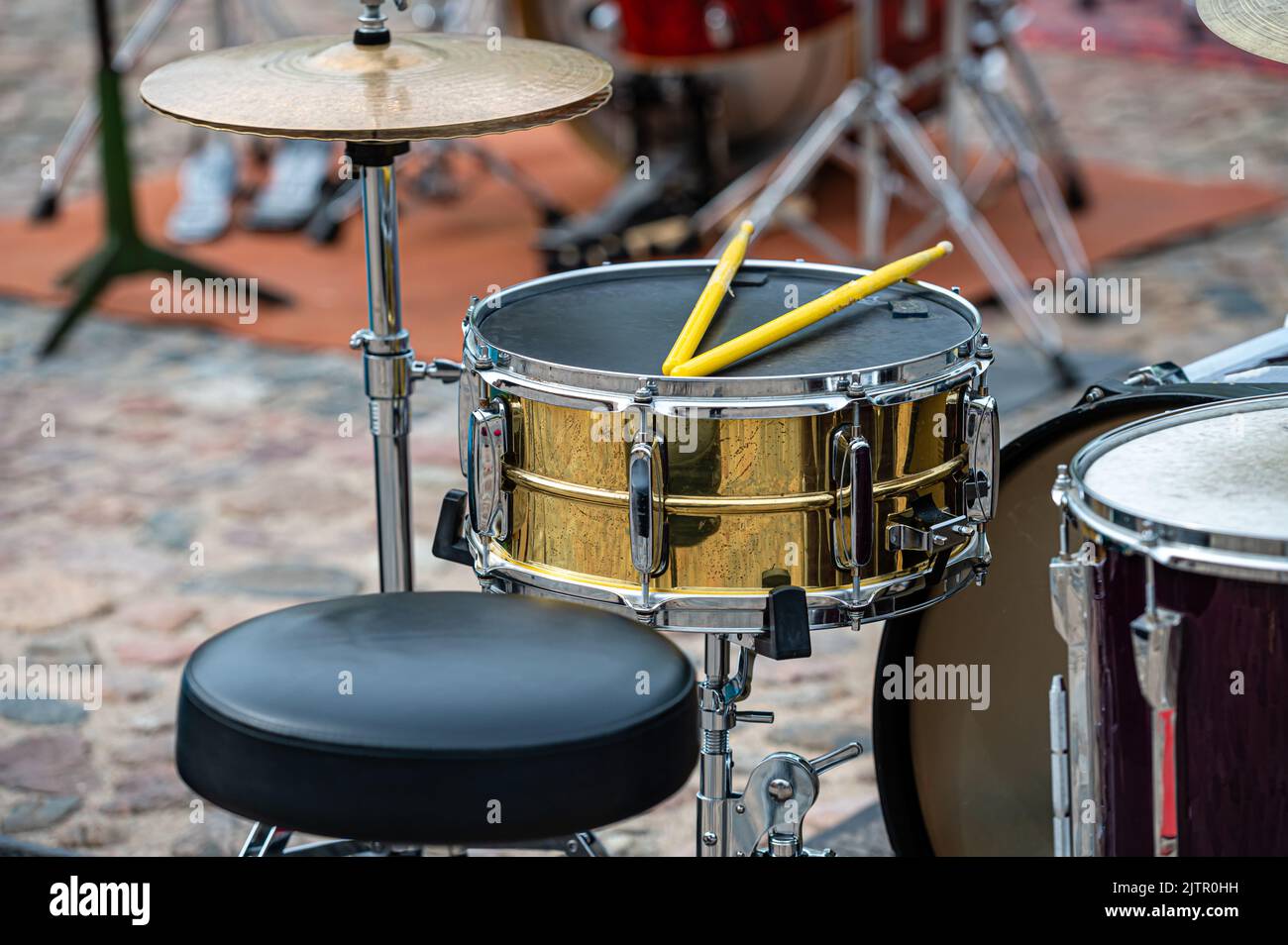 A set of plates in a drum set. At a concert of percussion music ...