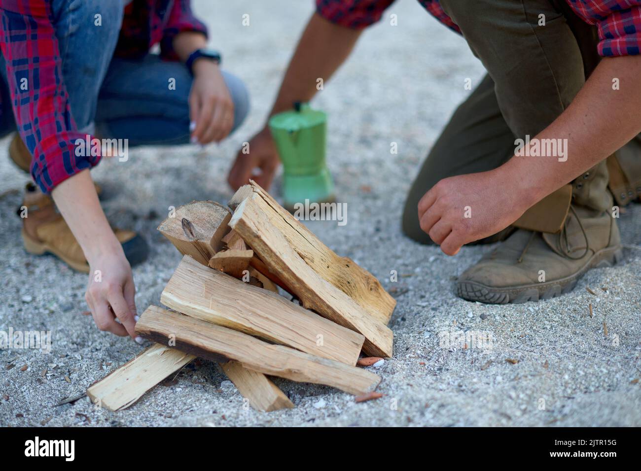 Camp start fire woman hi-res stock photography and images - Alamy