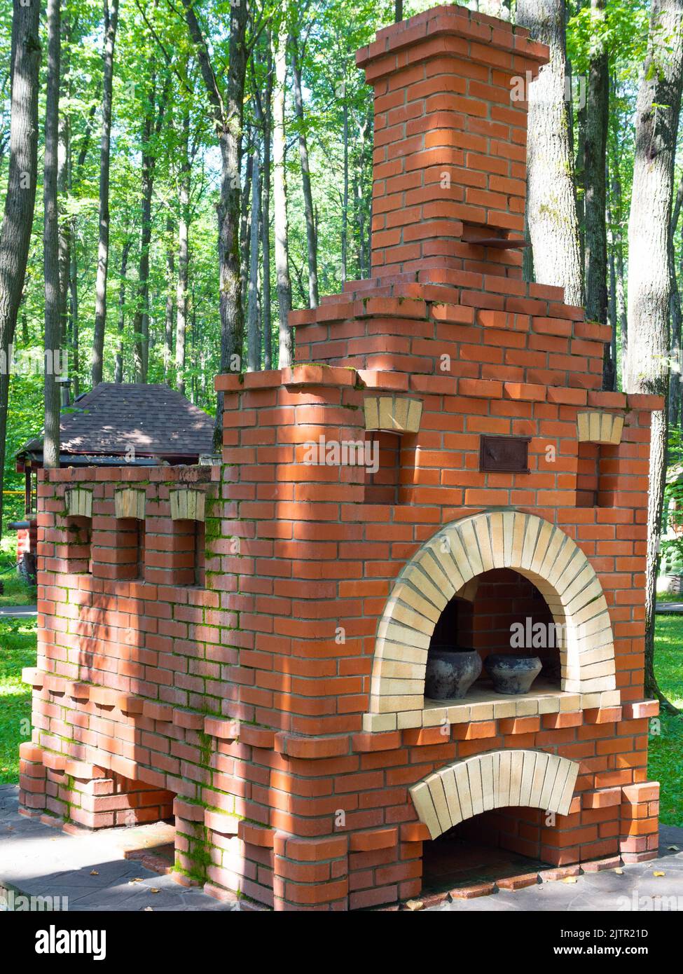 brick russian stove in green city park outdoors Stock Photo - Alamy