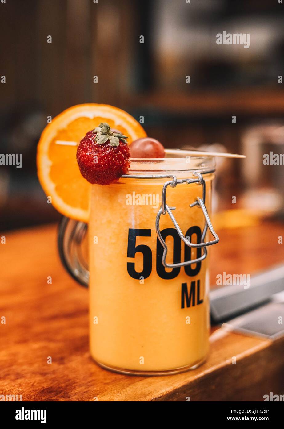tropical cocktail of alcohol and natural juices Stock Photo - Alamy