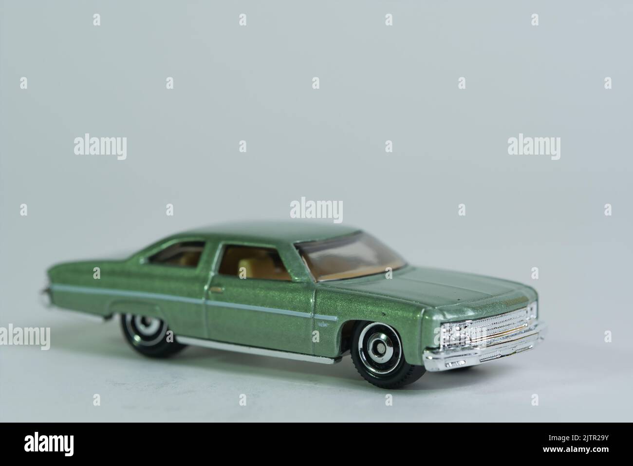 Retro toy car, classic car on white background, front view Stock Photo ...
