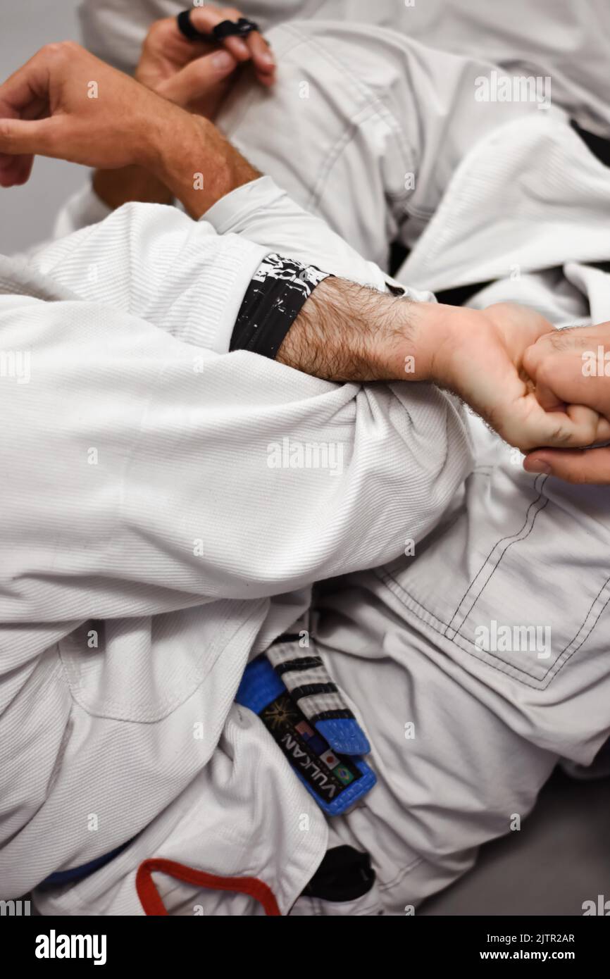Two grapplers fighting in a jiu jistu match Stock Photo - Alamy