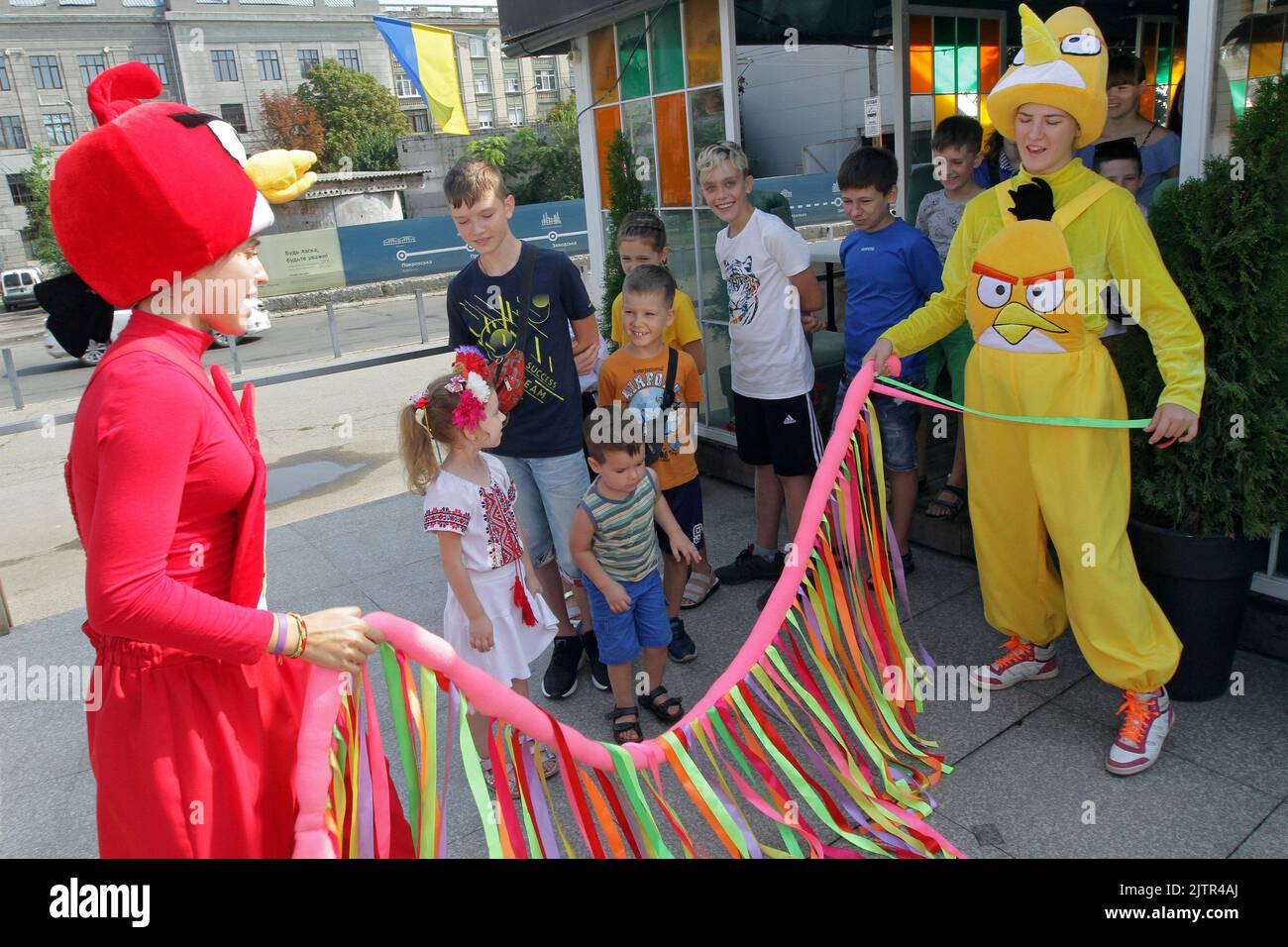 DNIPRO, UKRAINE - AUGUST 31, 2022 - Animators entertain children during ...