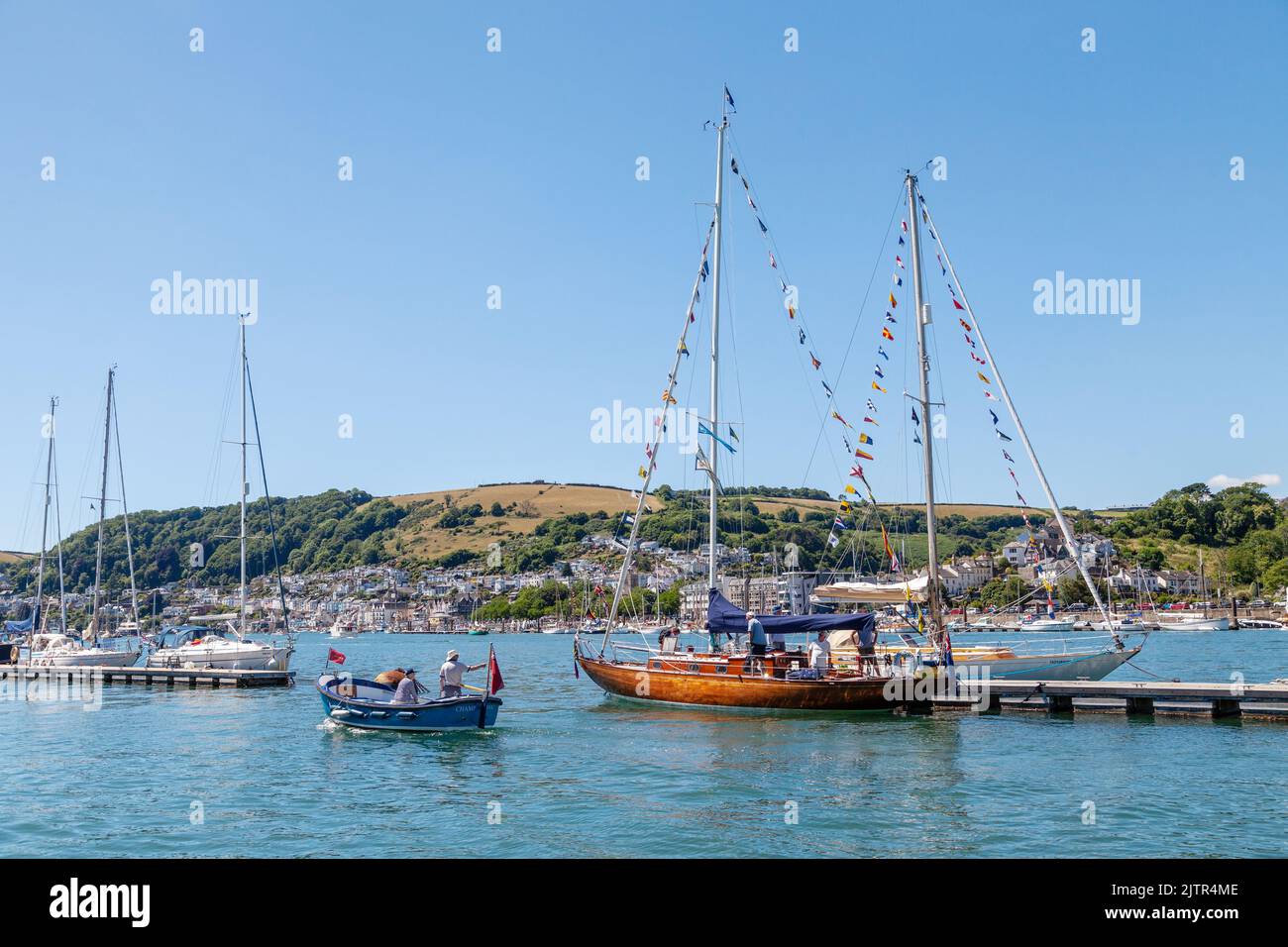 Classic sailing boats moored in Dartmouth Harbour Stock Photo - Alamy