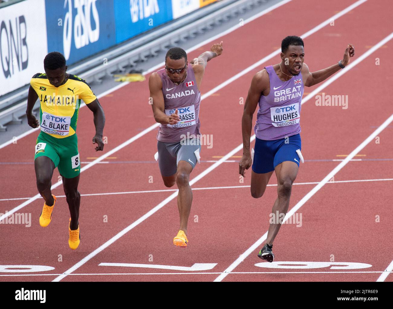 Ackeem Blake, Andre De Grasse and Zharnel Hughes competing in the men’s ...