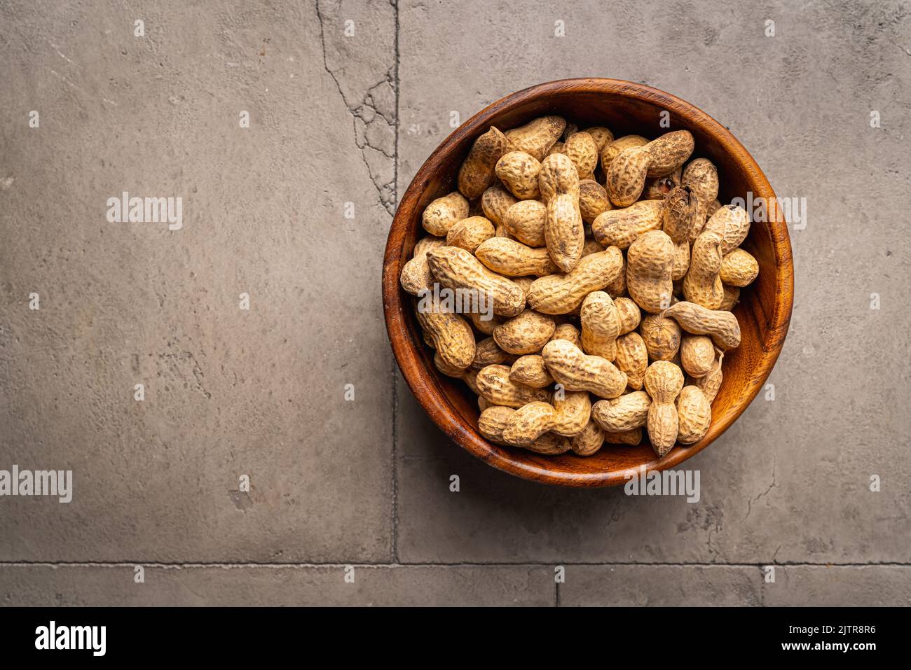 peanut nuts in a bowl Stock Photo - Alamy