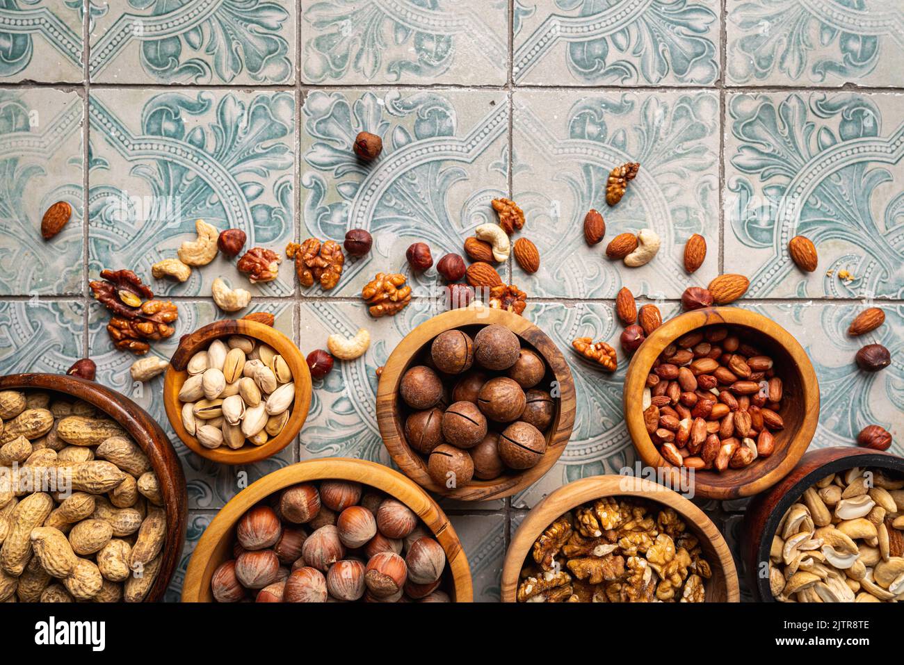 Assortment of nuts in bowls Stock Photo - Alamy