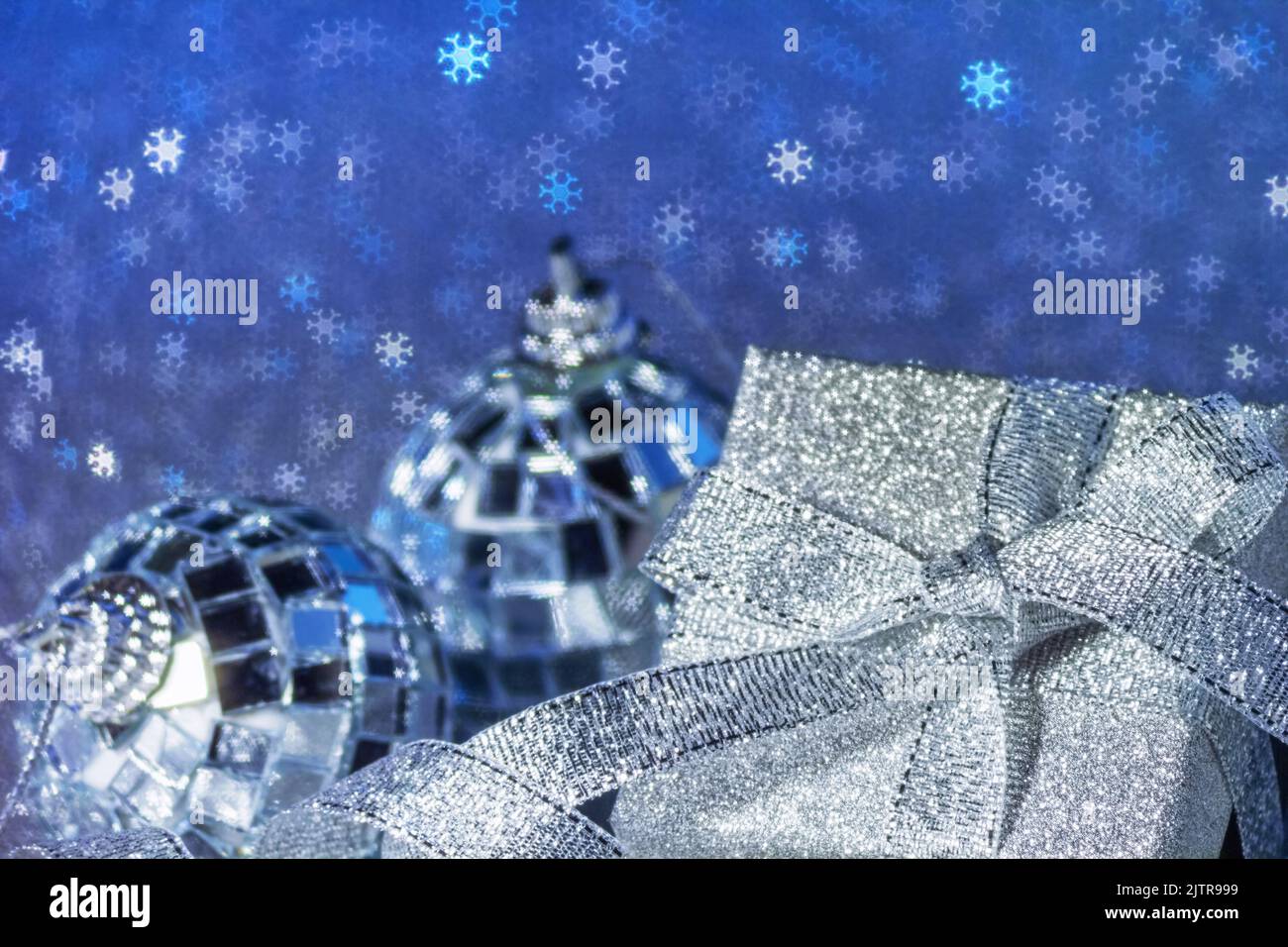 Christmas blue background with free place for text. Gift box close-up ...
