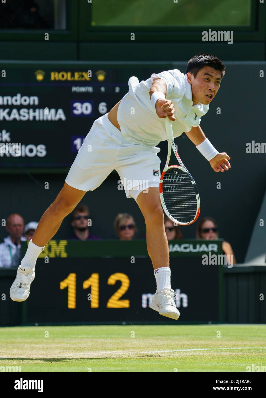 Brandon Nakashima of the USA in action at Wimbledon Championships 2022 ...