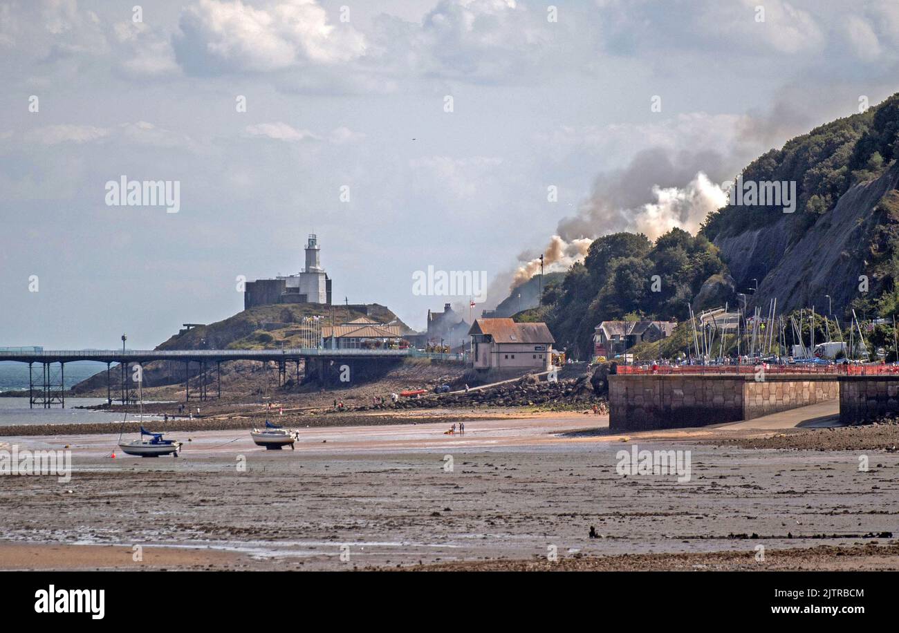 Smoke billows into the sky as a major fire broke out at the old ...
