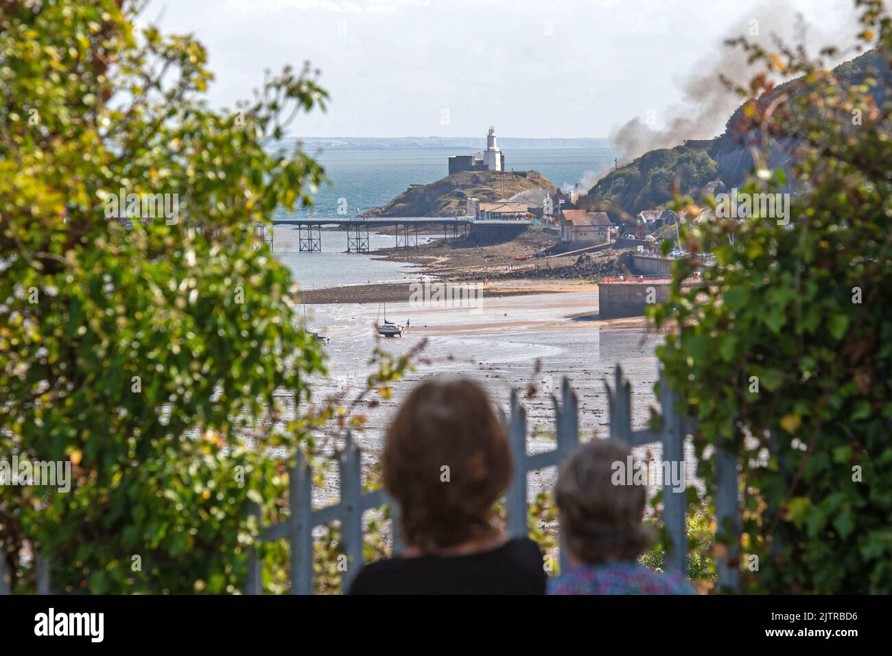 Smoke billows into the sky as a major fire broke out at the old ...