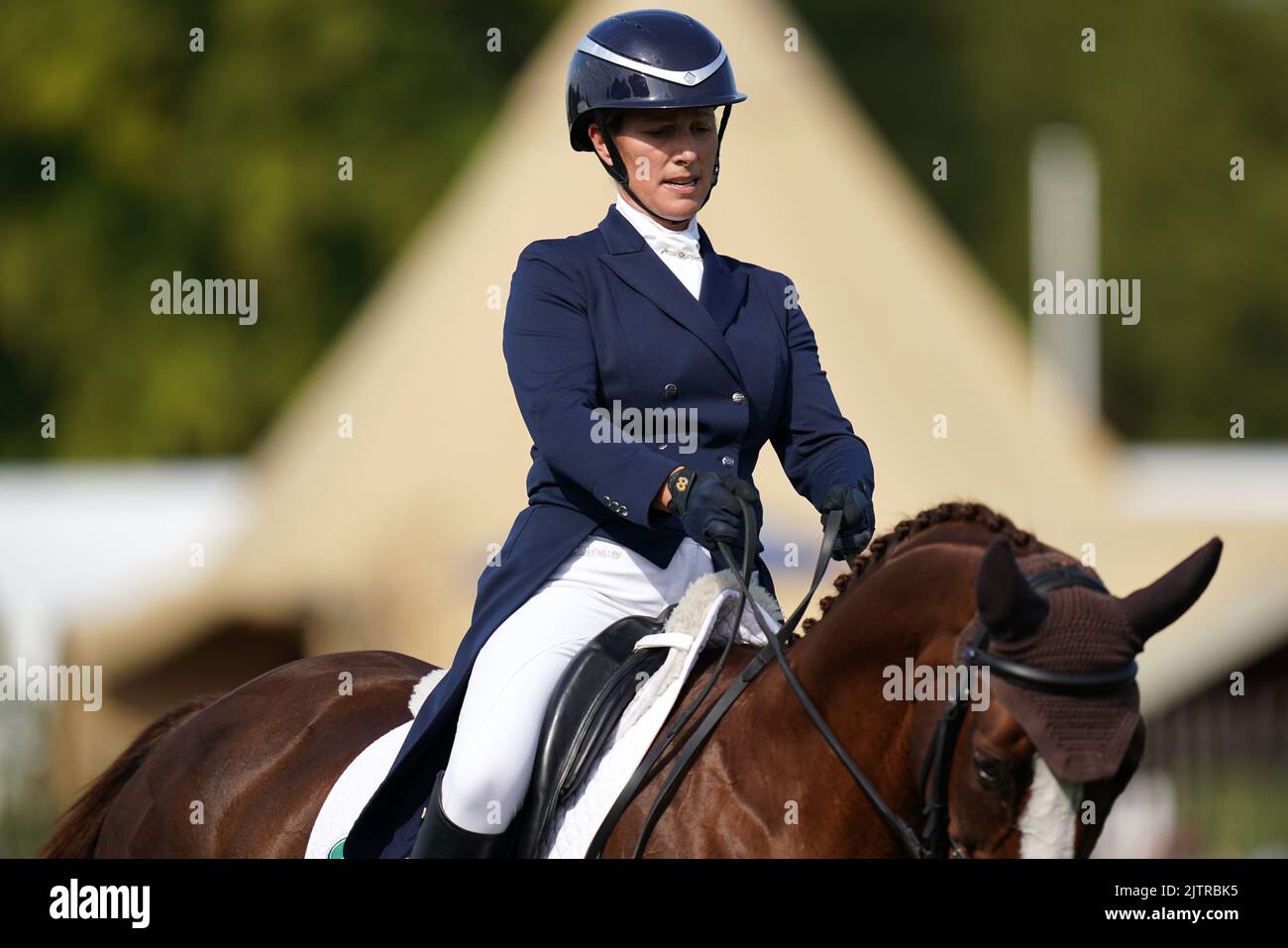 Zara Tindall heads over to the warm up area prior to their ...