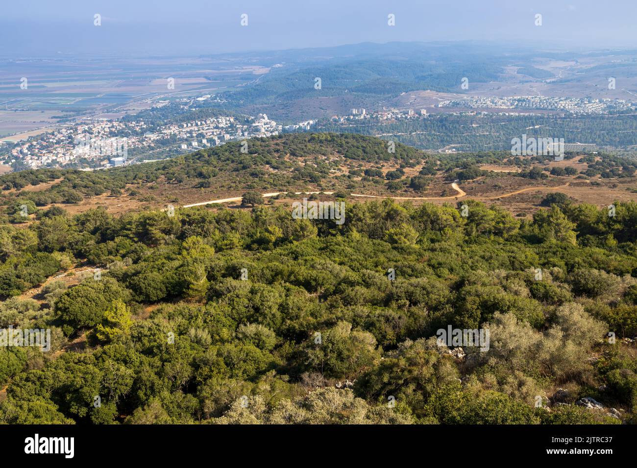 View of the Jezreel Valley in fog in winter cloudy day from Muhraqa on ...