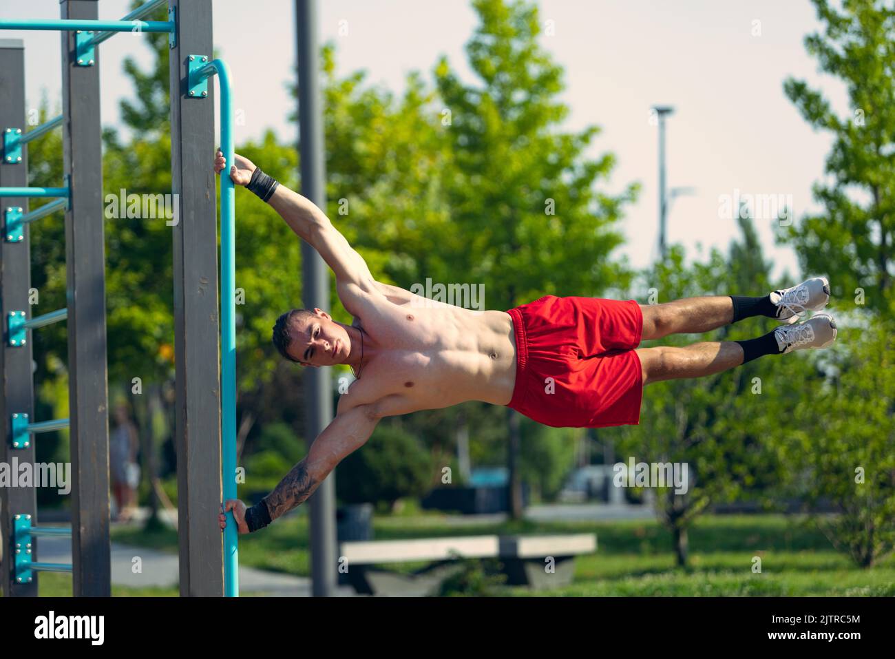 Workout. Strong muscular man, student training, practicing at sport ...