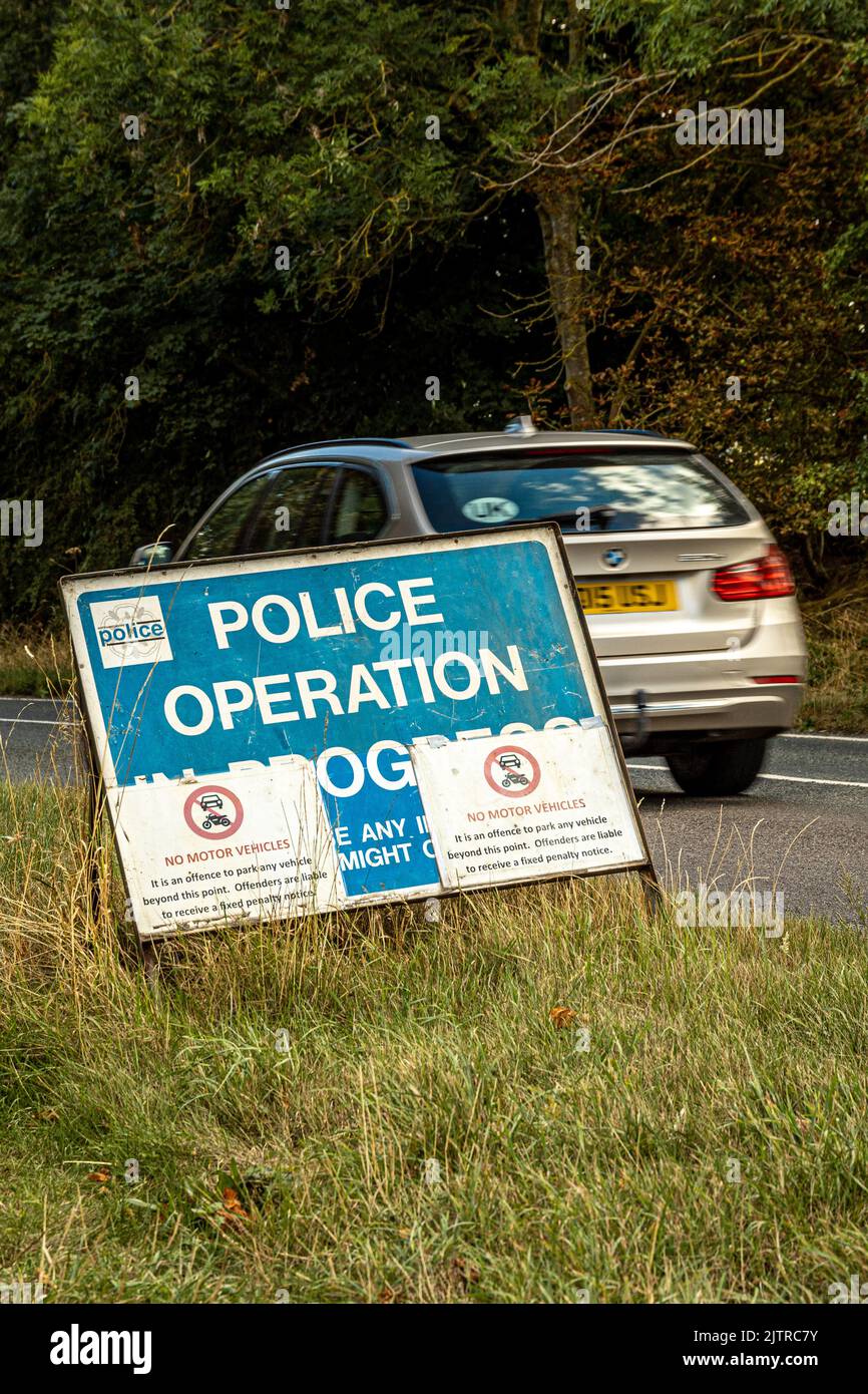 A sign saying Police Operation in progress Stock Photo - Alamy