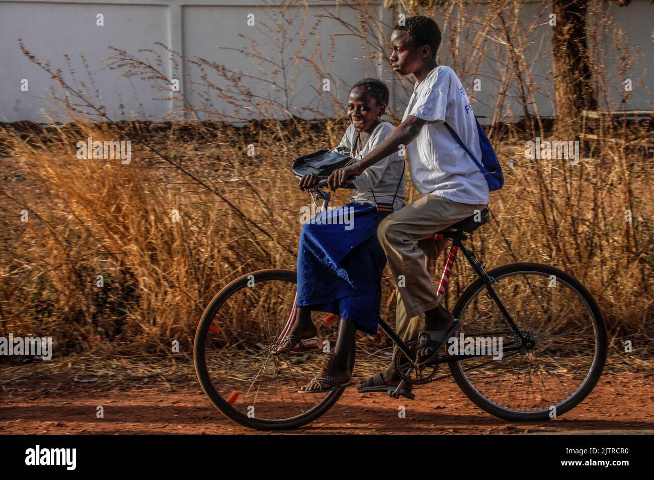 Two kids going to school Stock Photo - Alamy