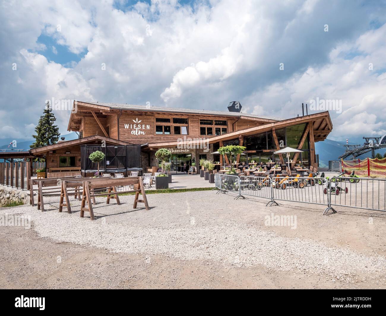 The image is of the Wiesenalm high alp recreation area located above ...