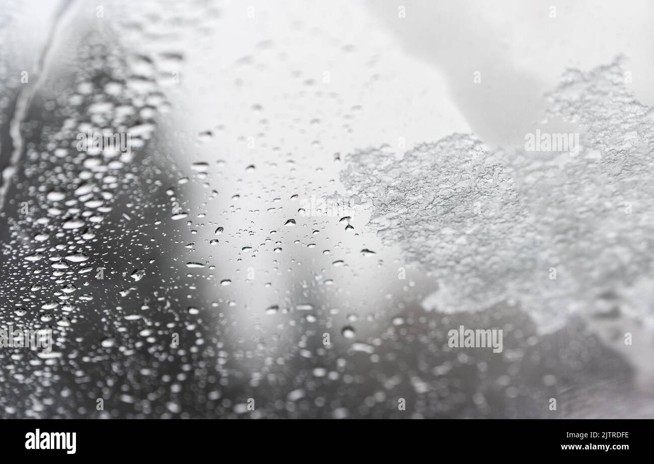 Snow on the windshield of the car. Winter weather for drivers. Snowfall ...