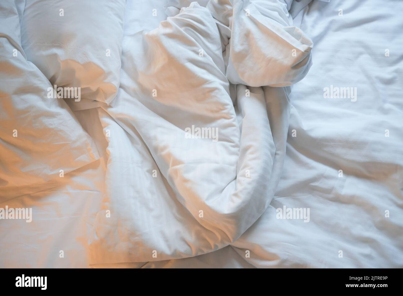 messy bed in early morning , messy bed after waking up Stock Photo - Alamy