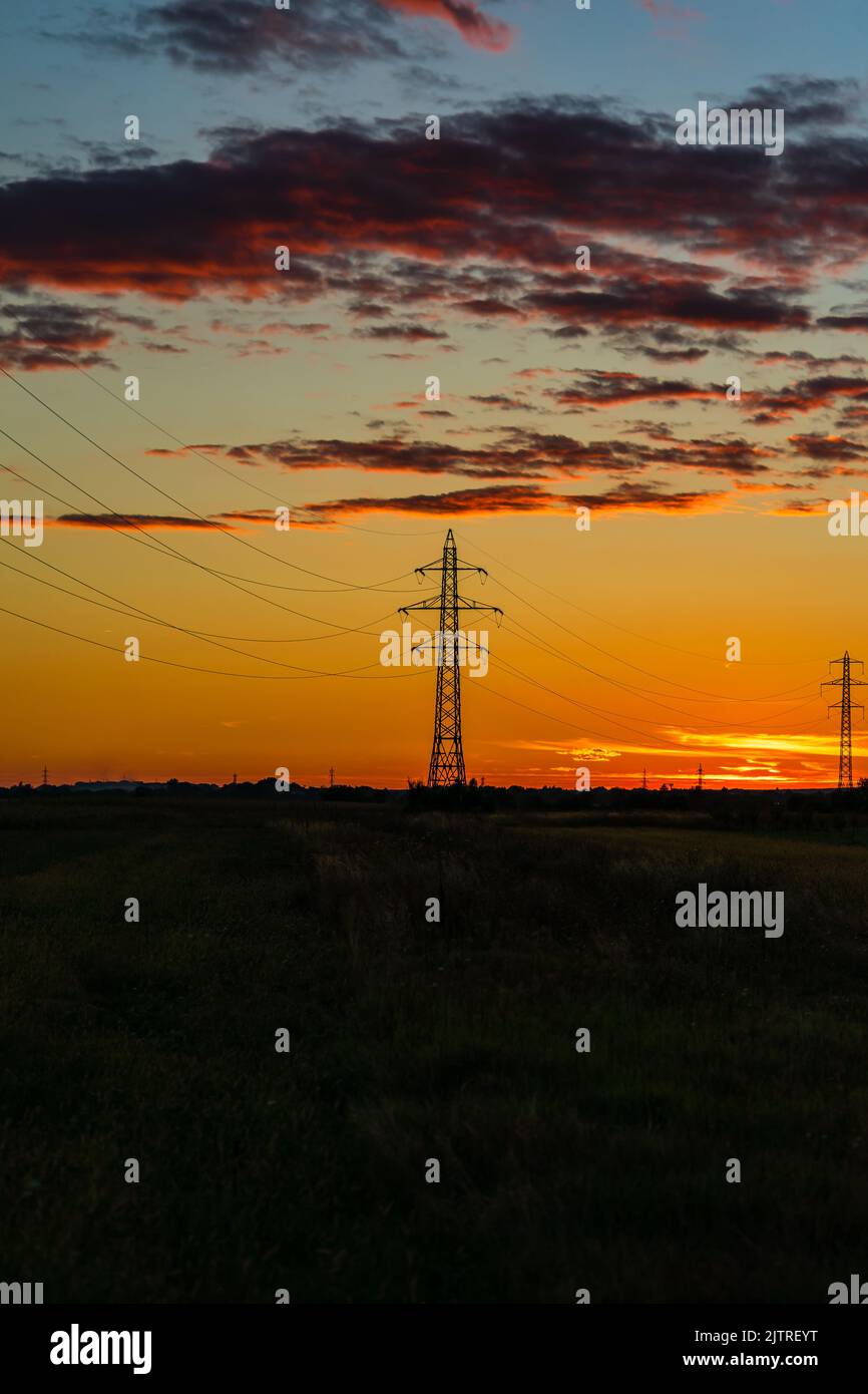 Detail of electric pole with electric cables and crop fields Stock ...