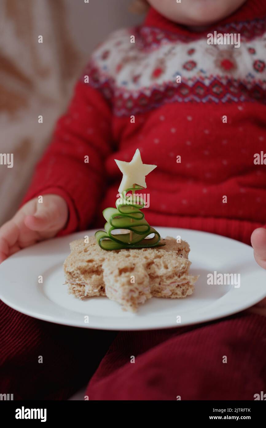 Cucumber shaped to look like a Christmas tree on a cocktail stick ...