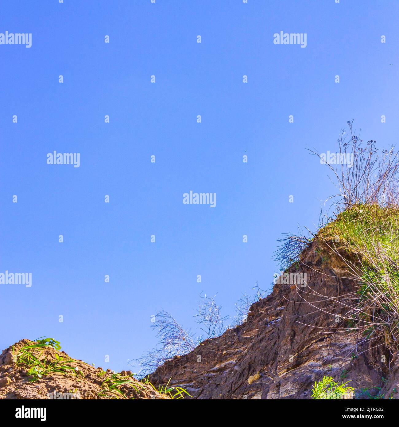 Excavated sand mountains and rubble piles quarry lake dredging pond ...