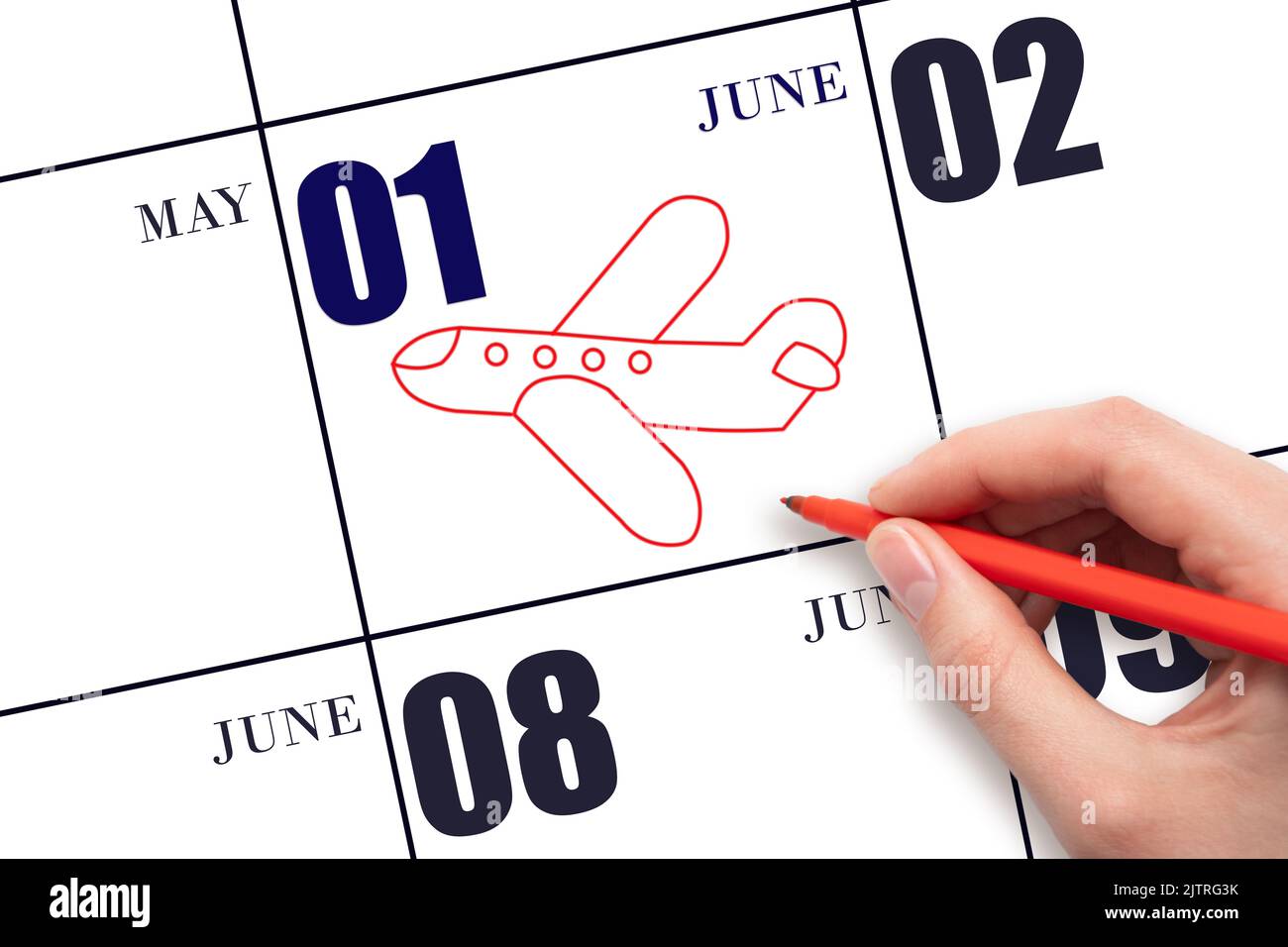 1st day of June. A hand drawing outline of airplane on calendar date 1 ...