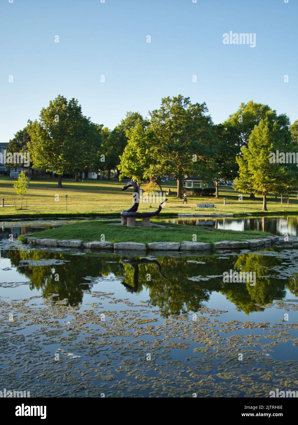 Dragon Statue in the Middle of Reflective Waters at Sar Ko Par Park in ...