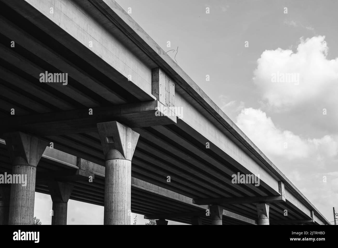 Section of newly constructed elevated highway.Shot against a bright ...