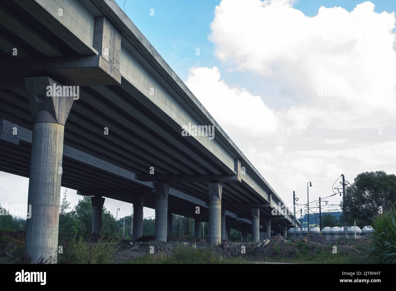 Section of newly constructed elevated highway.Shot against a bright ...