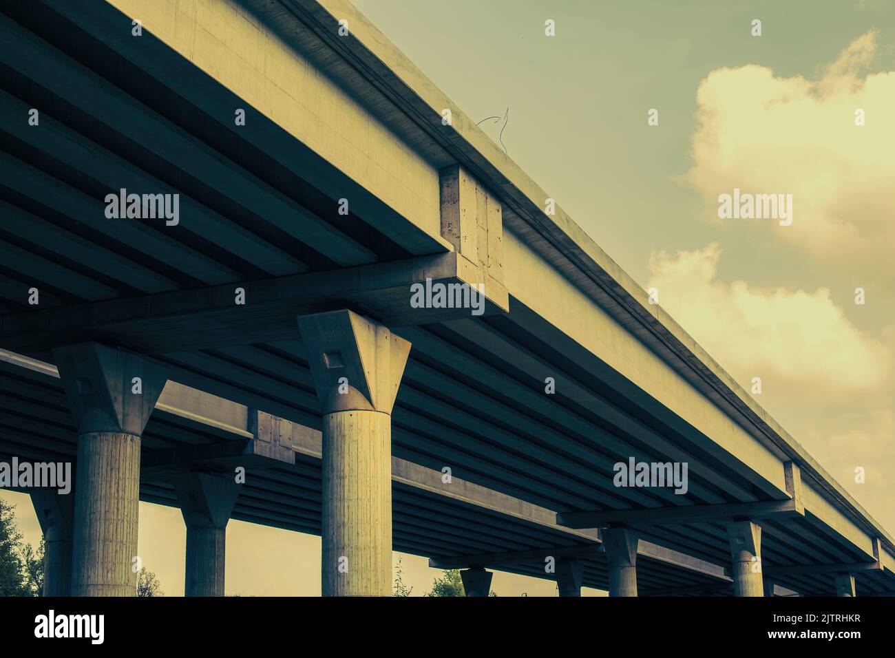Section of newly constructed elevated highway.Shot against a bright ...