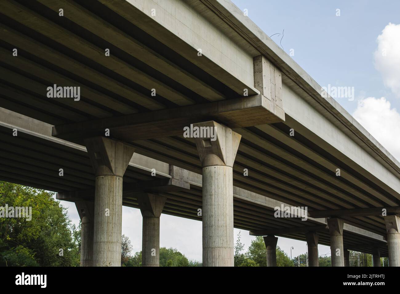 Section of newly constructed elevated highway.Shot against a bright ...