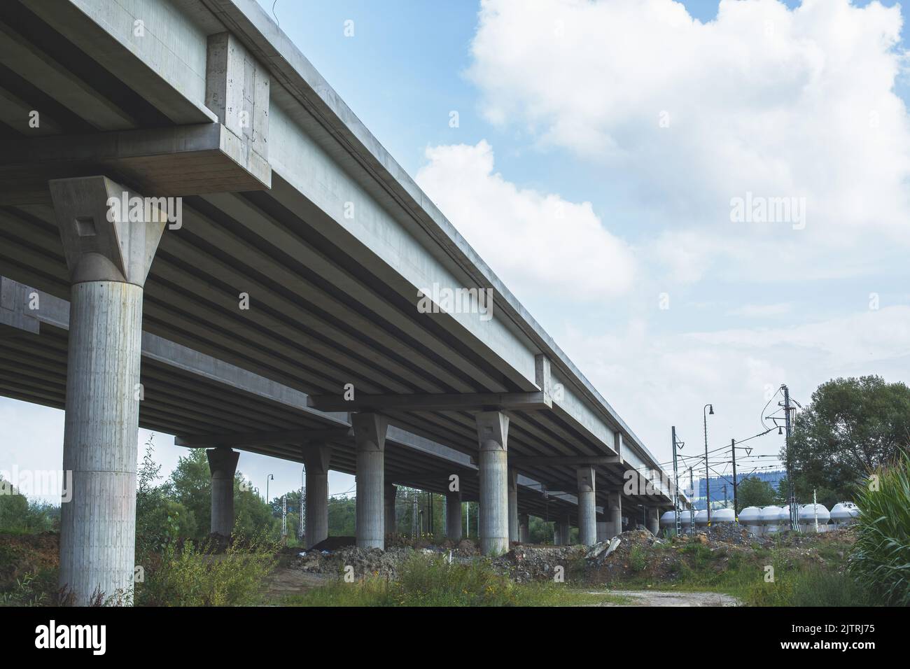 Section of newly constructed elevated highway.Shot against a bright ...