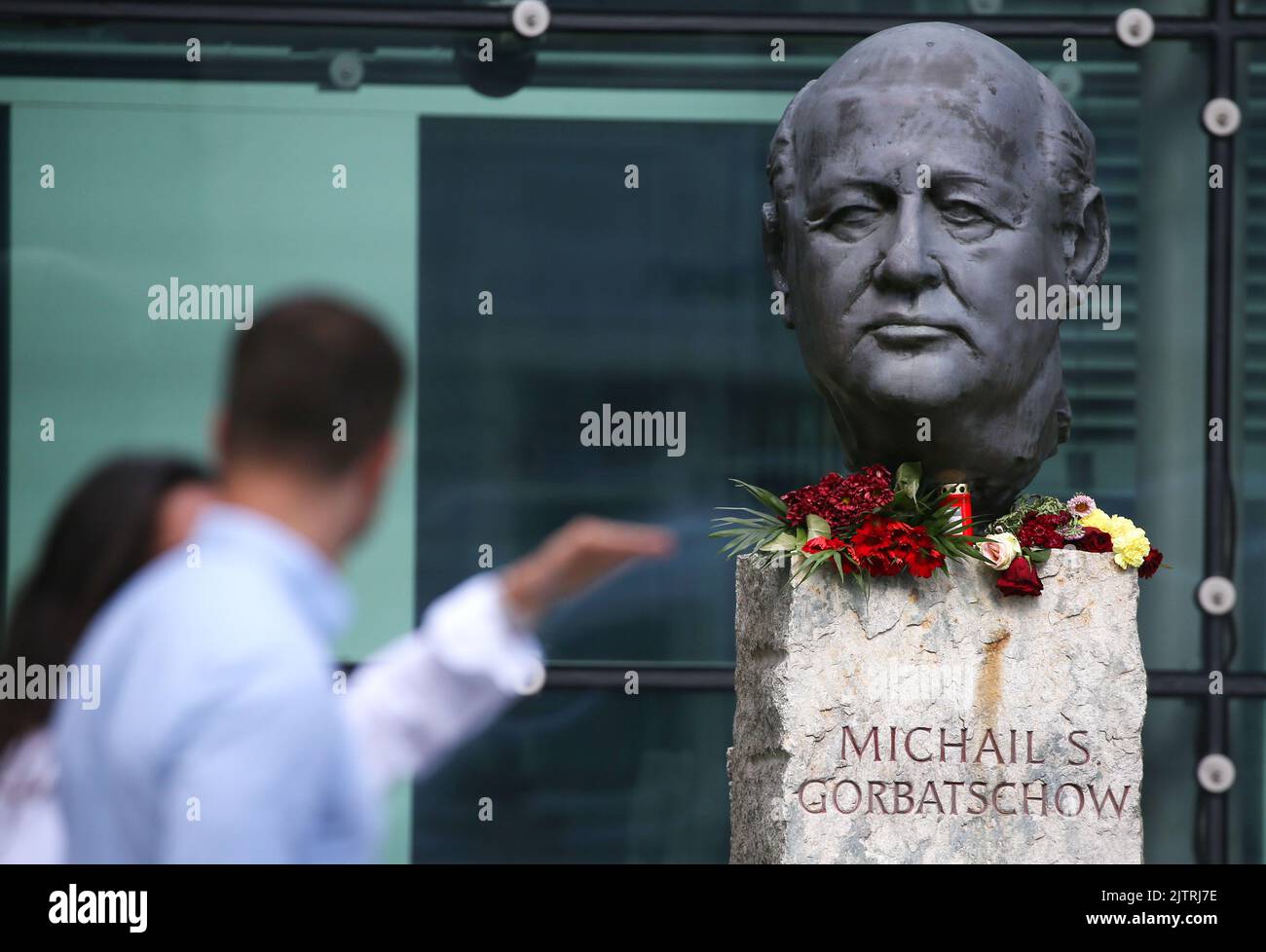 Berlin, Germany. 01st Sep, 2022. People look at a bust of Mikhail ...