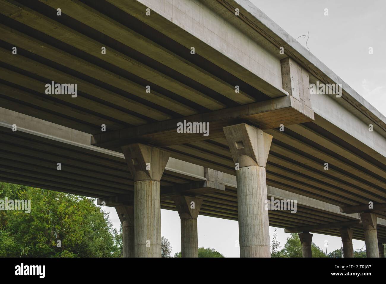 Section of newly constructed elevated highway.Shot against a bright ...