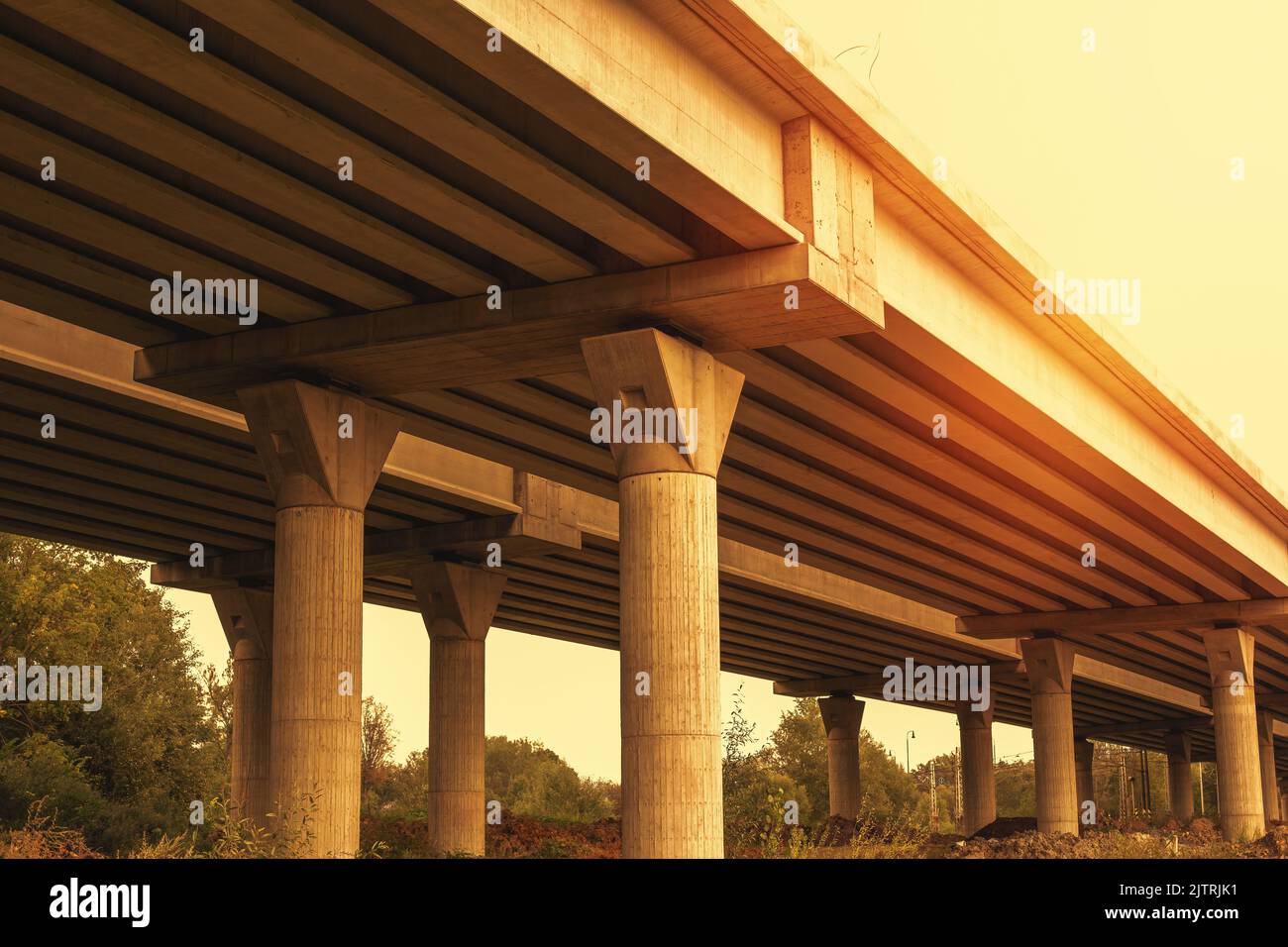 Section of newly constructed elevated highway.Shot against a bright ...