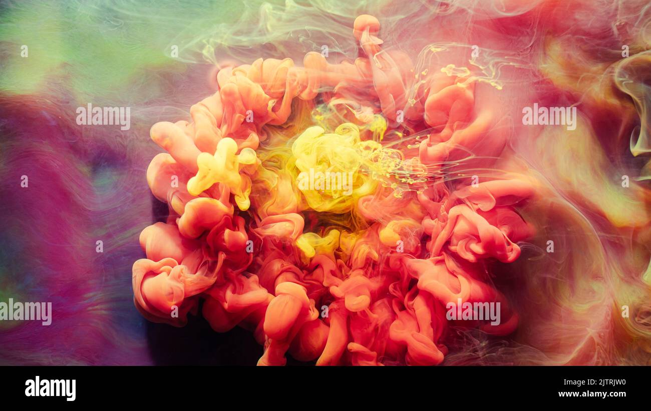 Ink water explosion. Sorcery alchemy. Pink yellow smog effect. Abstract ...