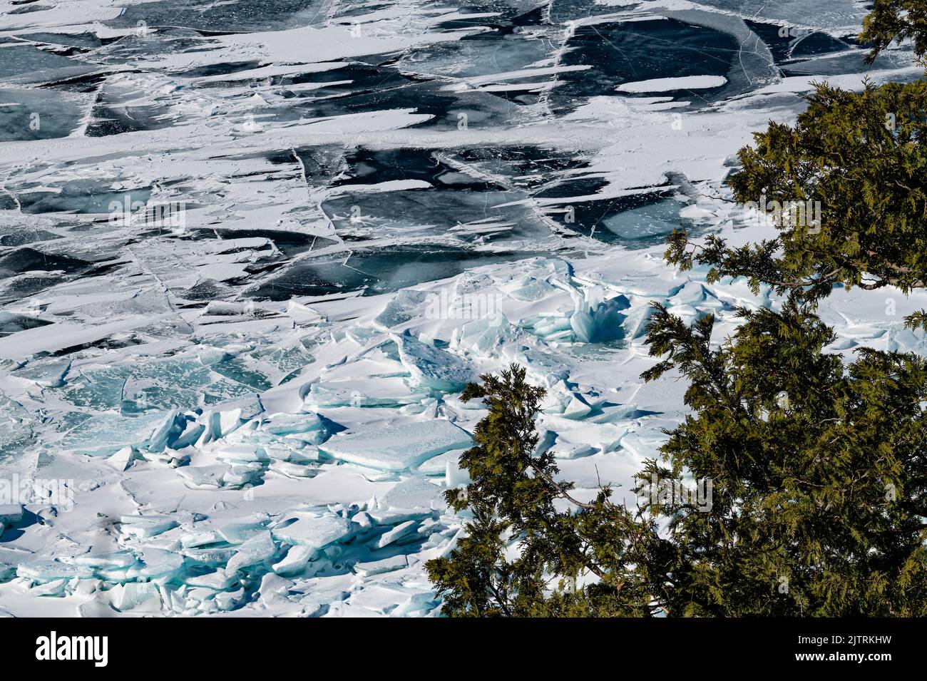 Ice patterns and piles on the Green Bay water of Lake Michigan are ...
