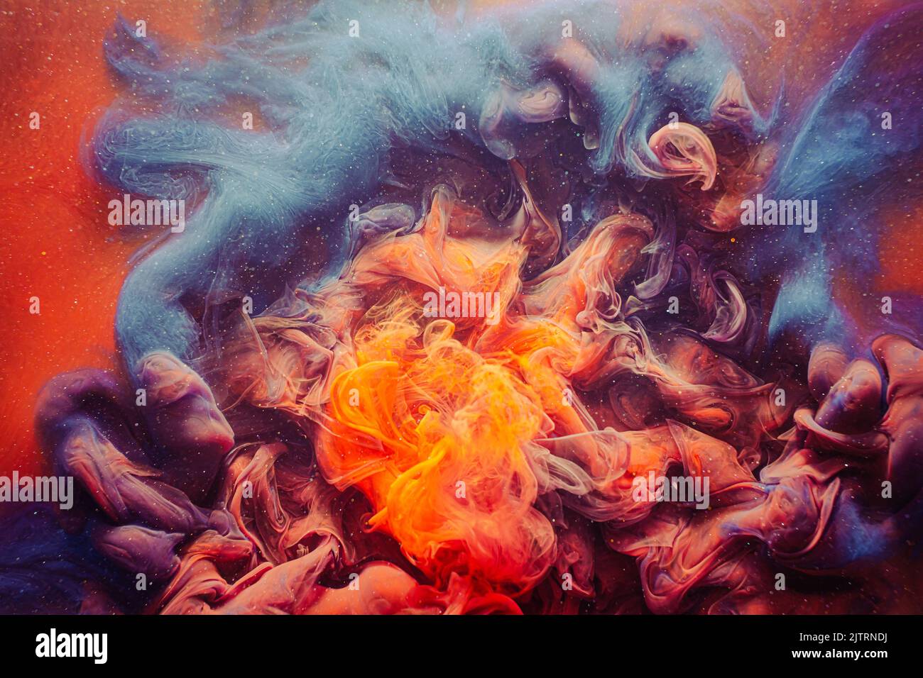 haze background magic fire flames orange blue Stock Photo - Alamy