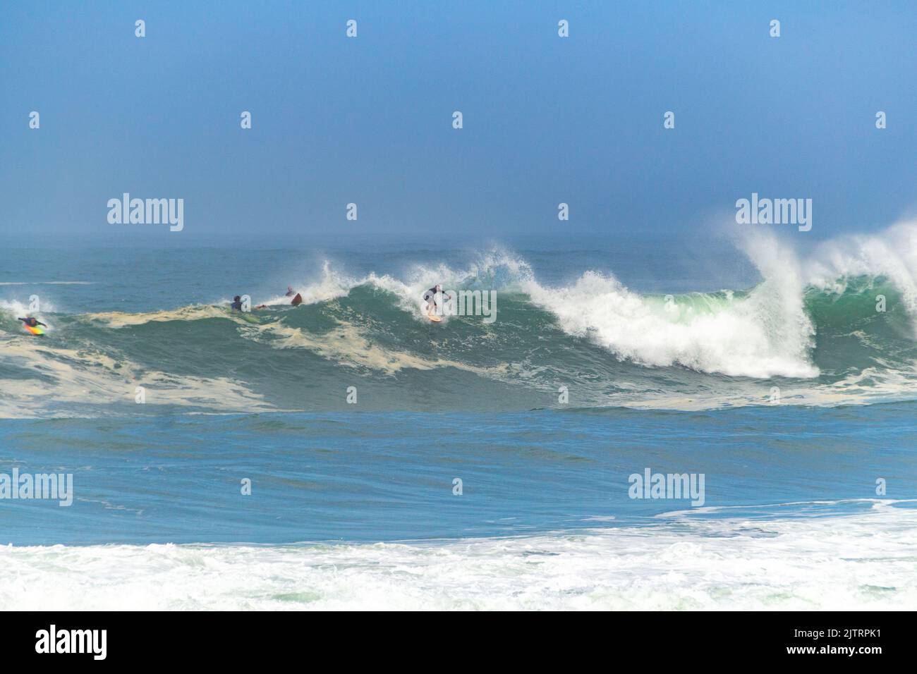 surfer riding a wave at leblon beach in Rio de Janeiro, Brazil - April ...