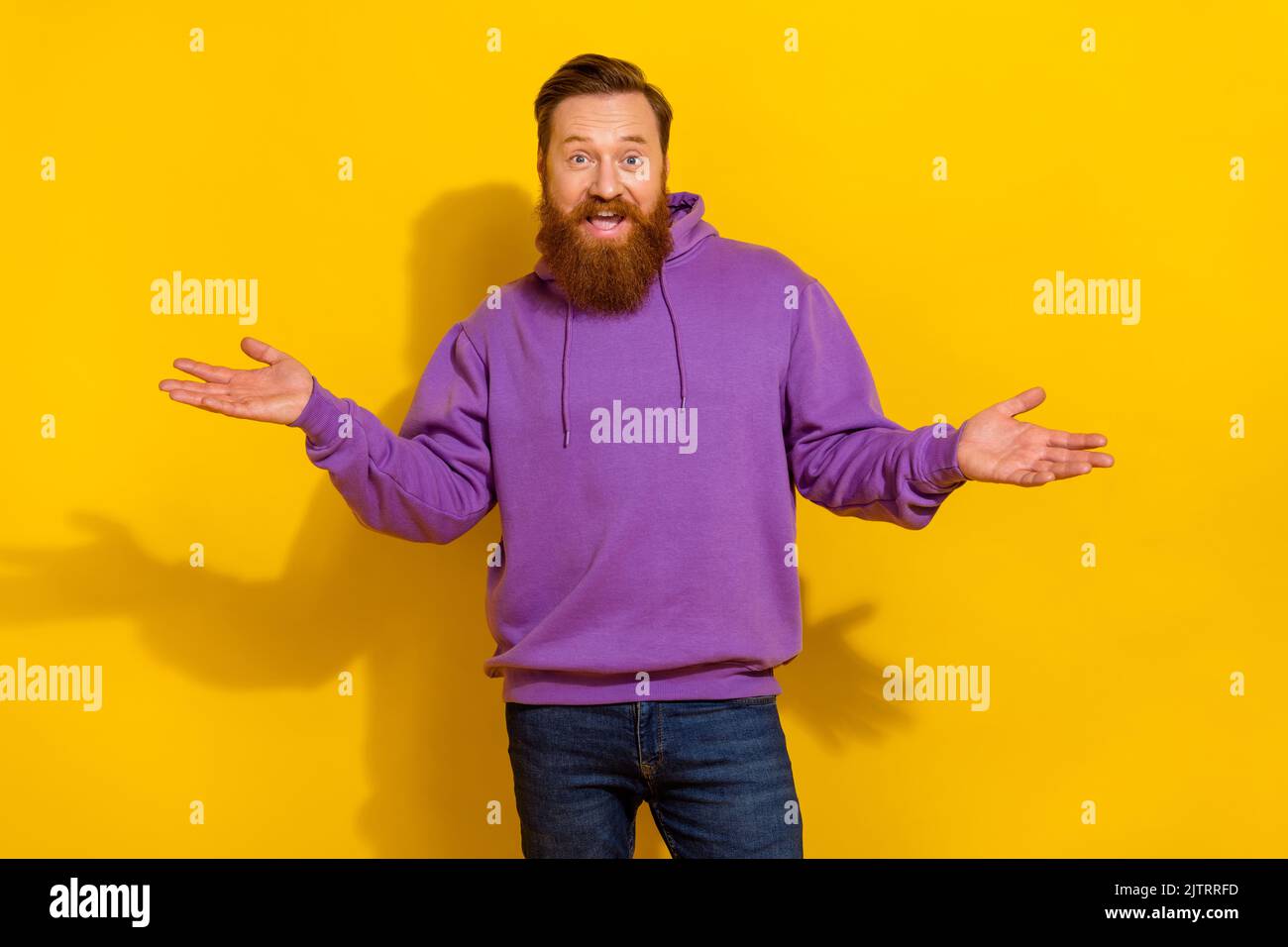 Photo of doubtful uncertain guy dressed purple sweater shrugging ...