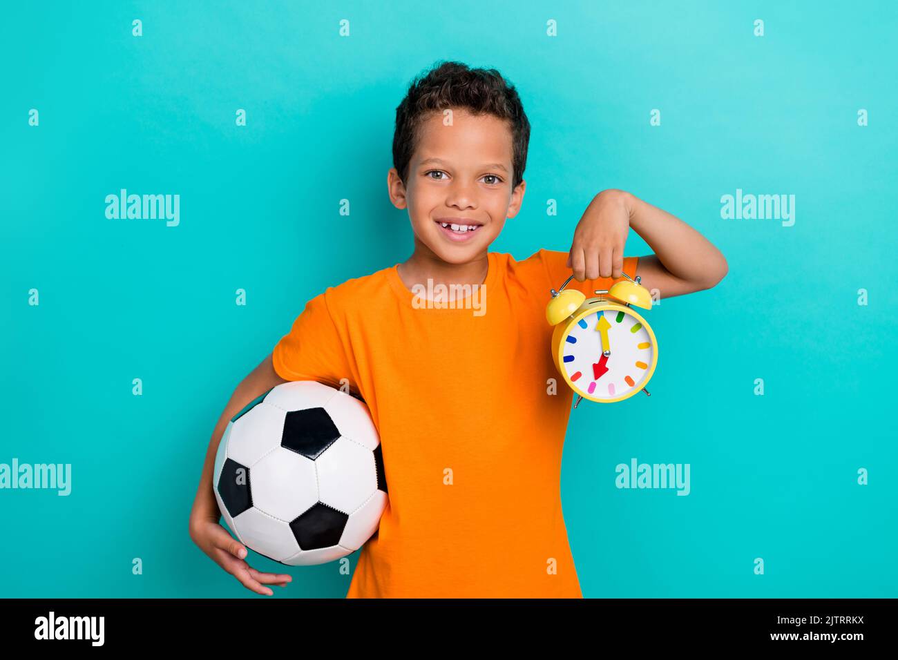Photo of pretty funky small man wear yellow t-shirt smiling holding ...