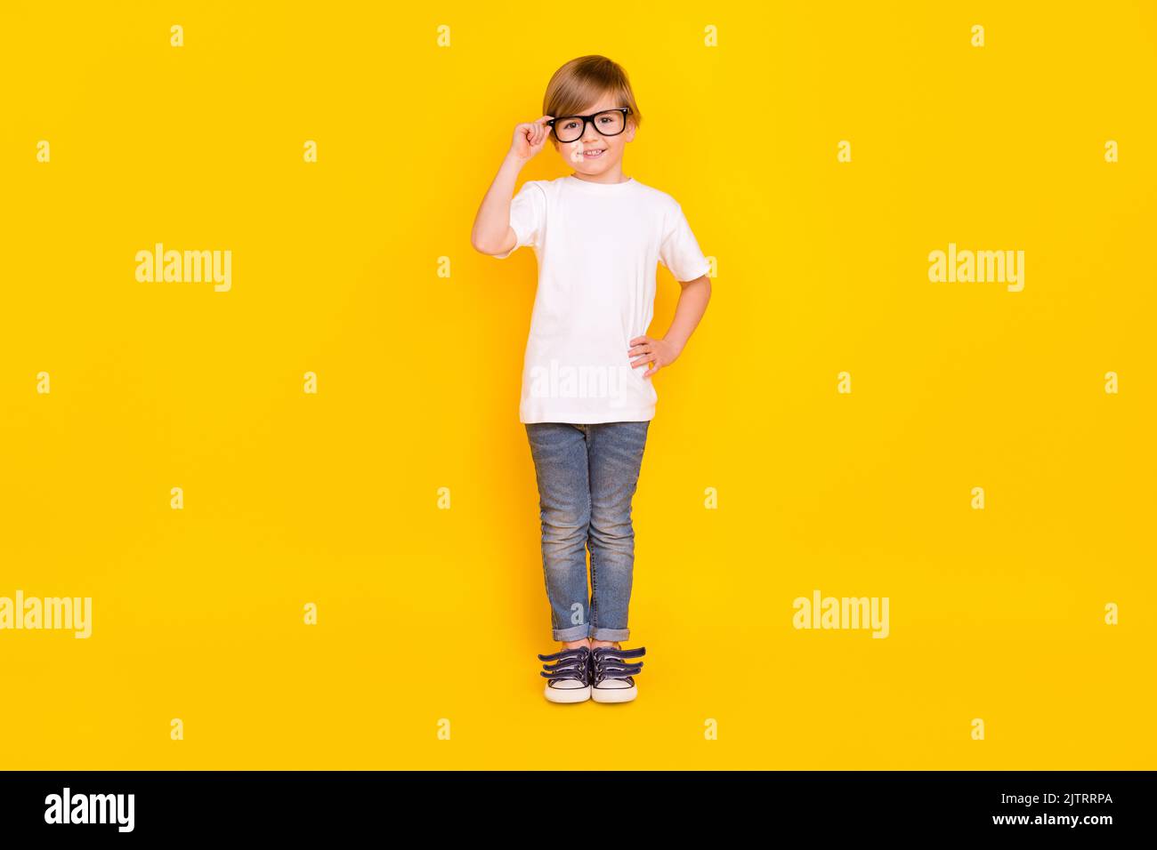 Full length body size view of handsome cheerful diligent pre-teen boy ...