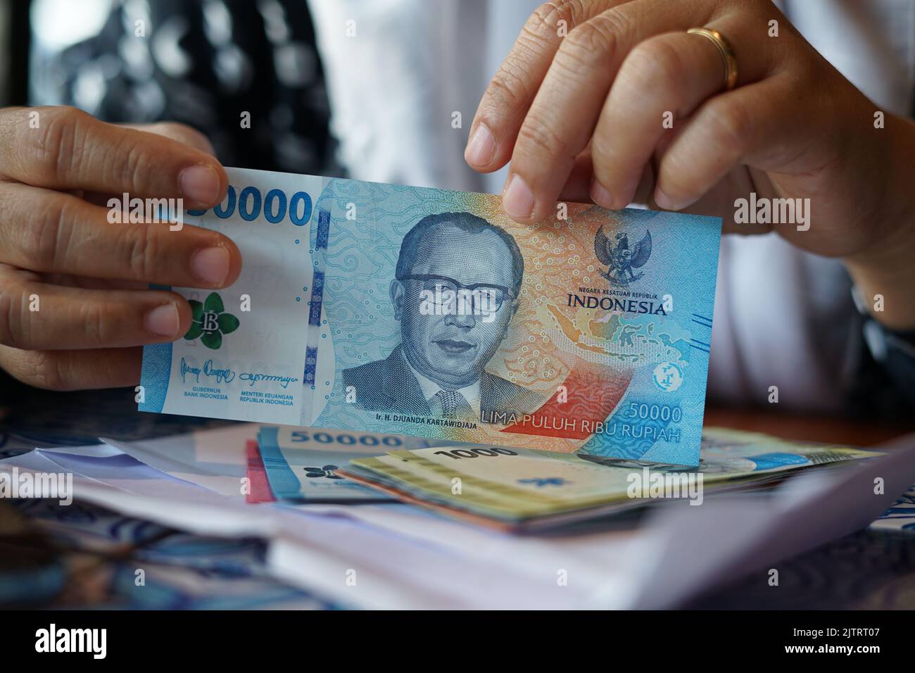 Indonesian banknotes hi-res stock photography and images - Alamy